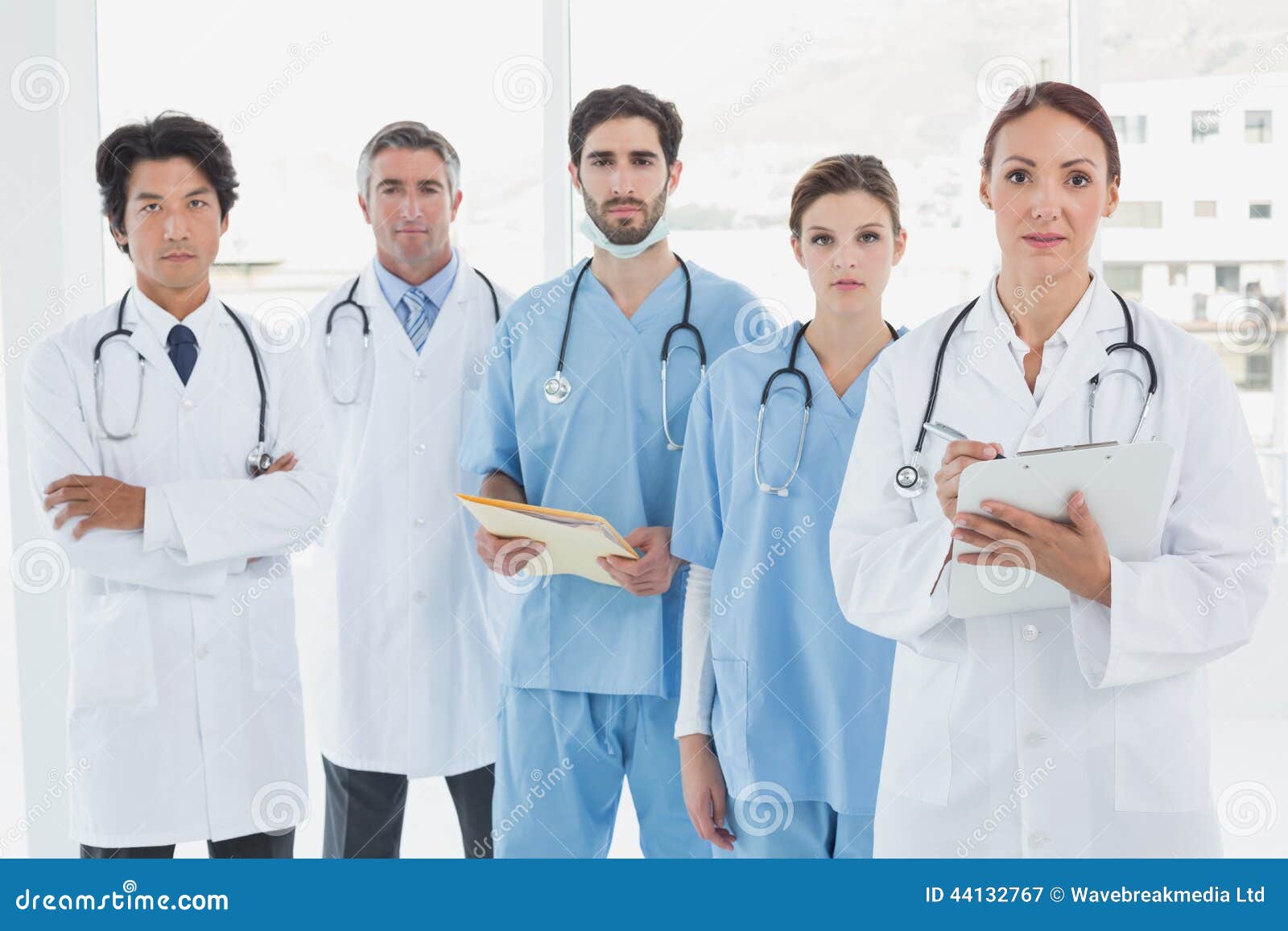 Serious Doctors All Standing Together Stock Image - Image of woman ...