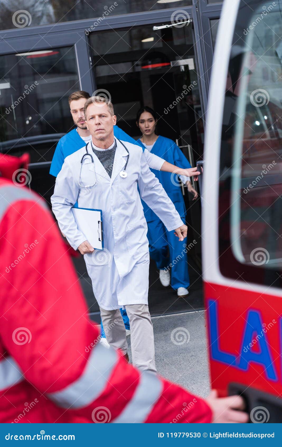 Serious Doctors Posing Together Crossing Arms Royalty-Free Stock Photo ...