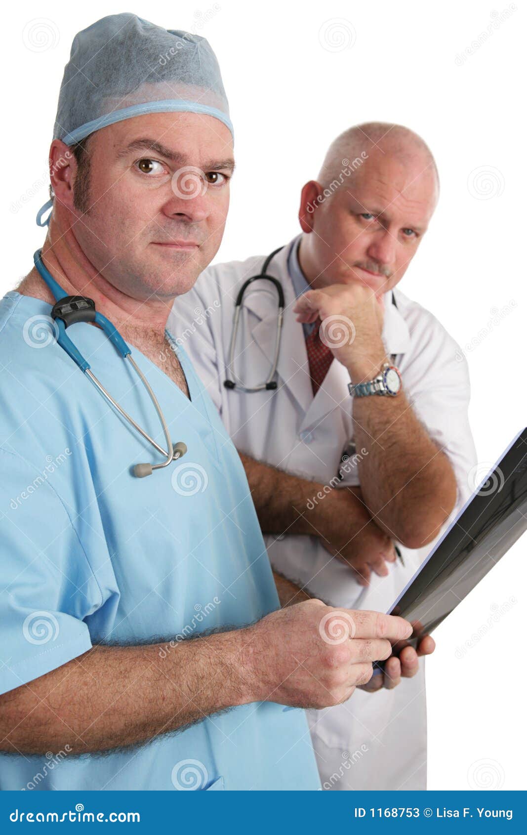 Serious Doctors with Xrays stock image. Image of laboratory - 1168753