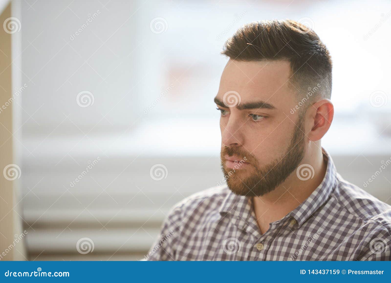 Serious employee stock image. Image of sitting, indoors - 143437159