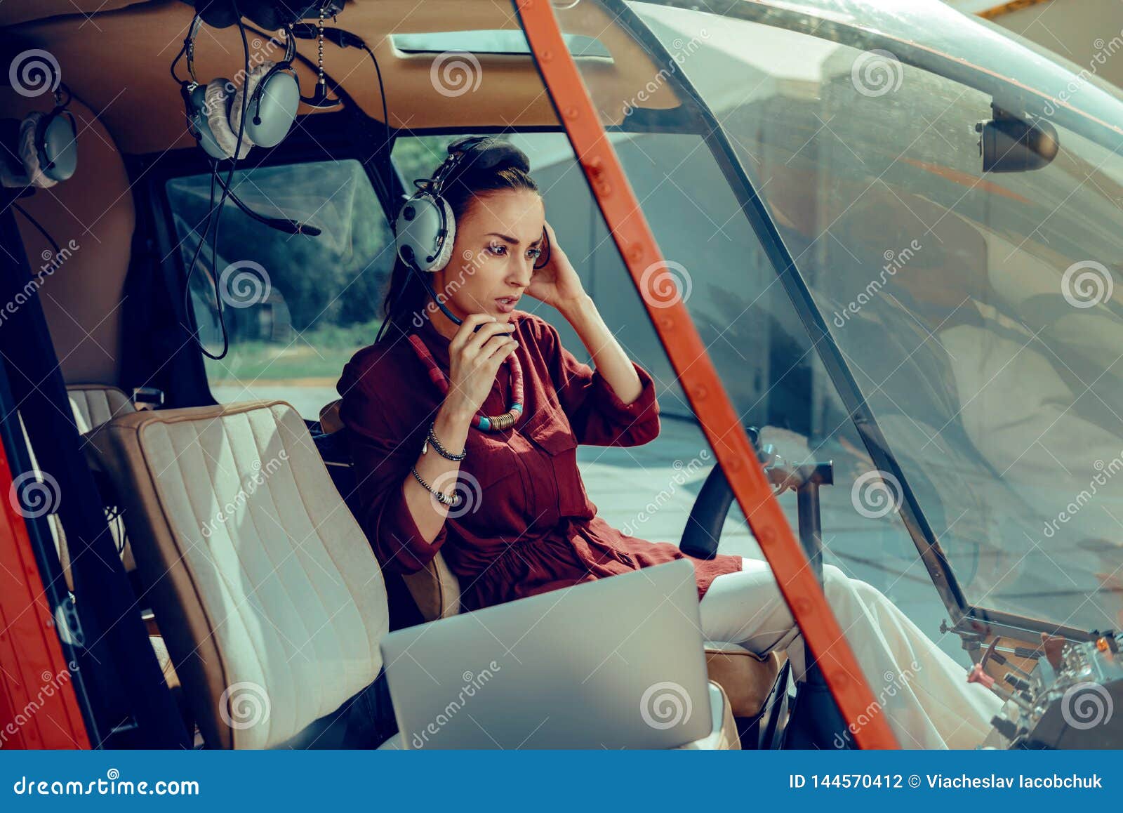 Serious Experienced Female Pilot Having Connection with Flight Operator ...