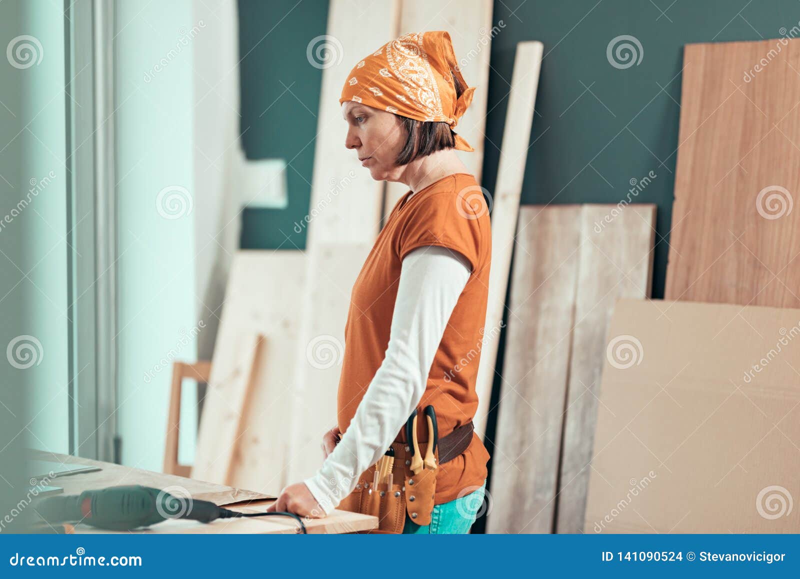 Serious Female Carpenter Thinking about Project Stock Photo - Image of ...