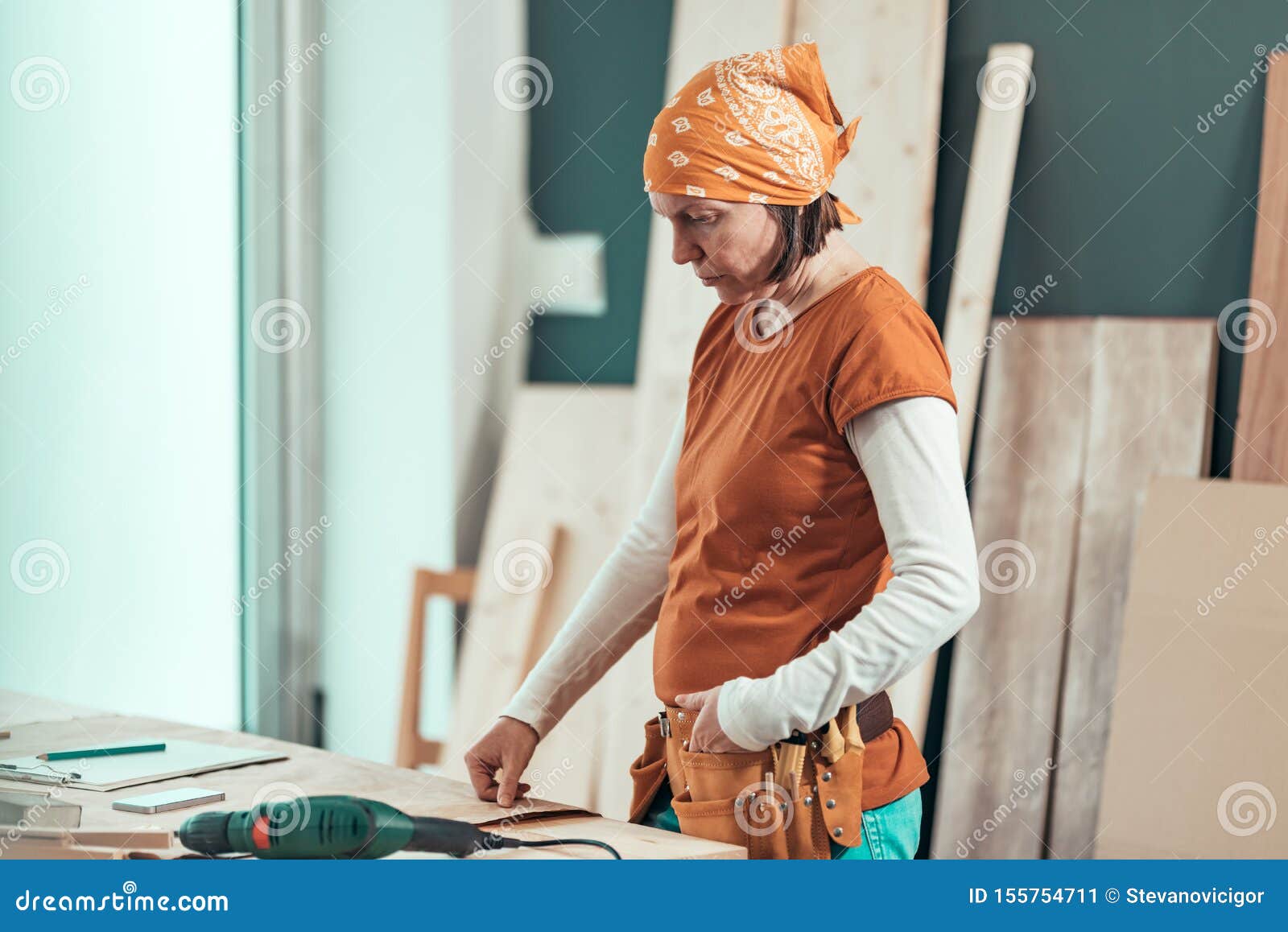 Serious Female Carpenter Thinking about Project Stock Image - Image of ...