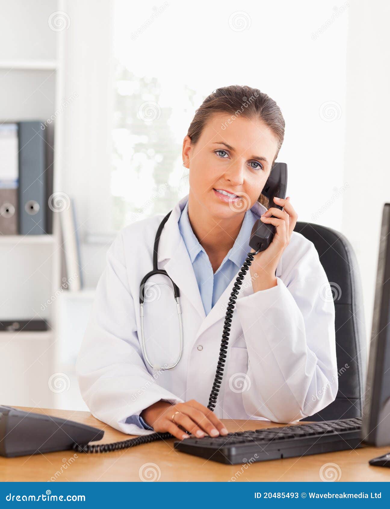 Serious Female Doctor on the Phone Stock Image - Image of business ...