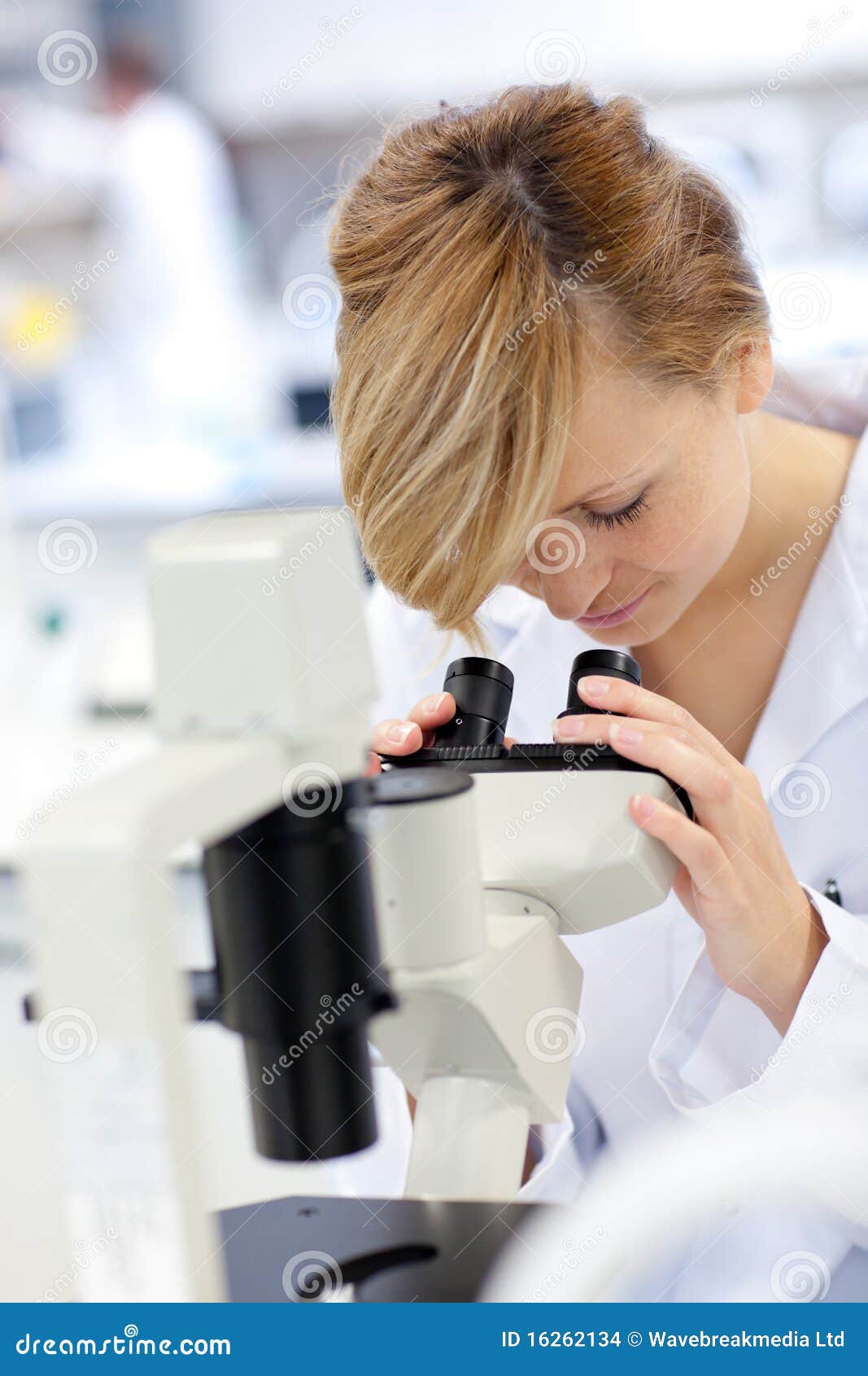 Serious Female Scientist Using a Microscope Stock Photo - Image of ...