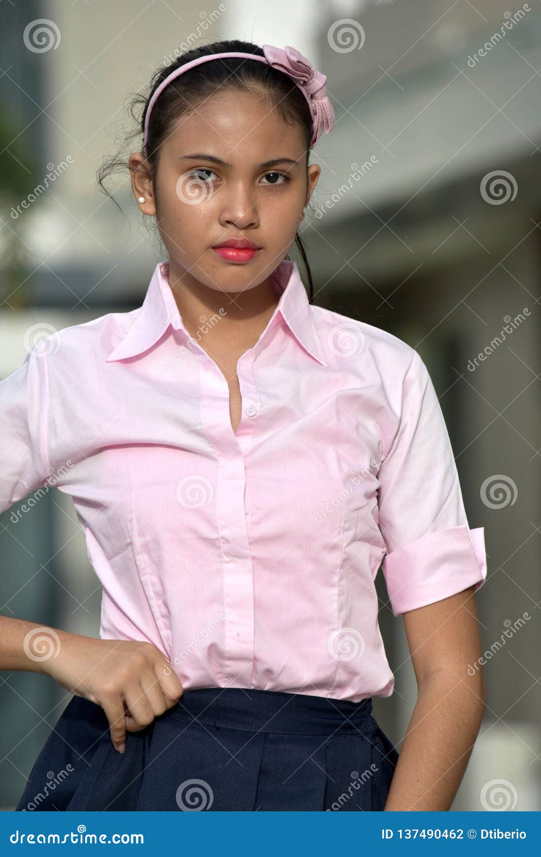 A Serious Female Youngster stock photo. Image of emotionless - 137490462