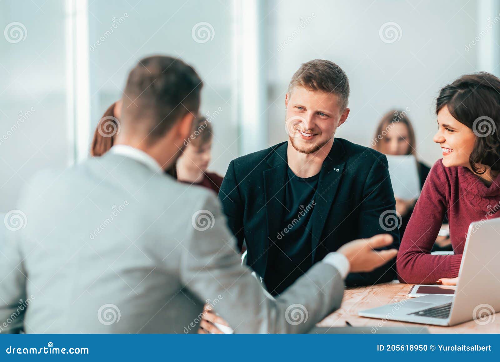 Serious Group of Employees Discussing Working Issues . Stock Photo ...