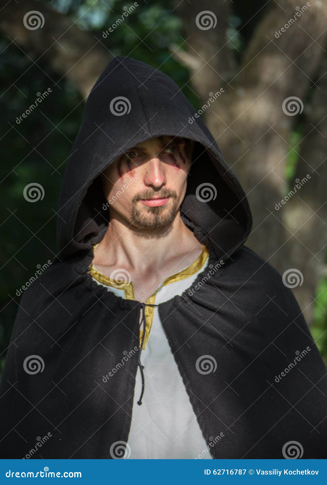 Serious Guy in a Black Robe Stock Image - Image of hooligan, adult ...