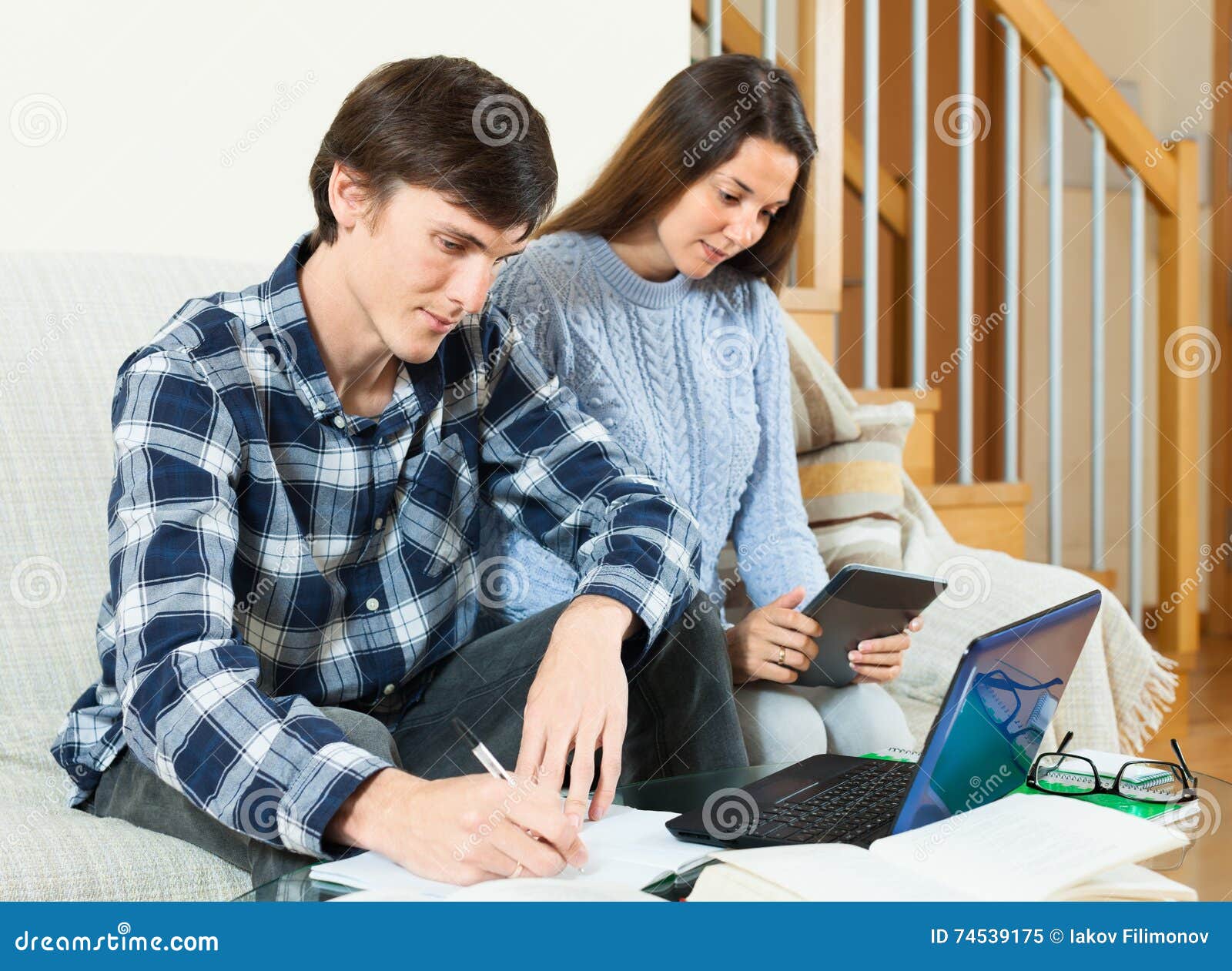 Serious Guy and Girl Doing Homework Stock Image - Image of girl ...