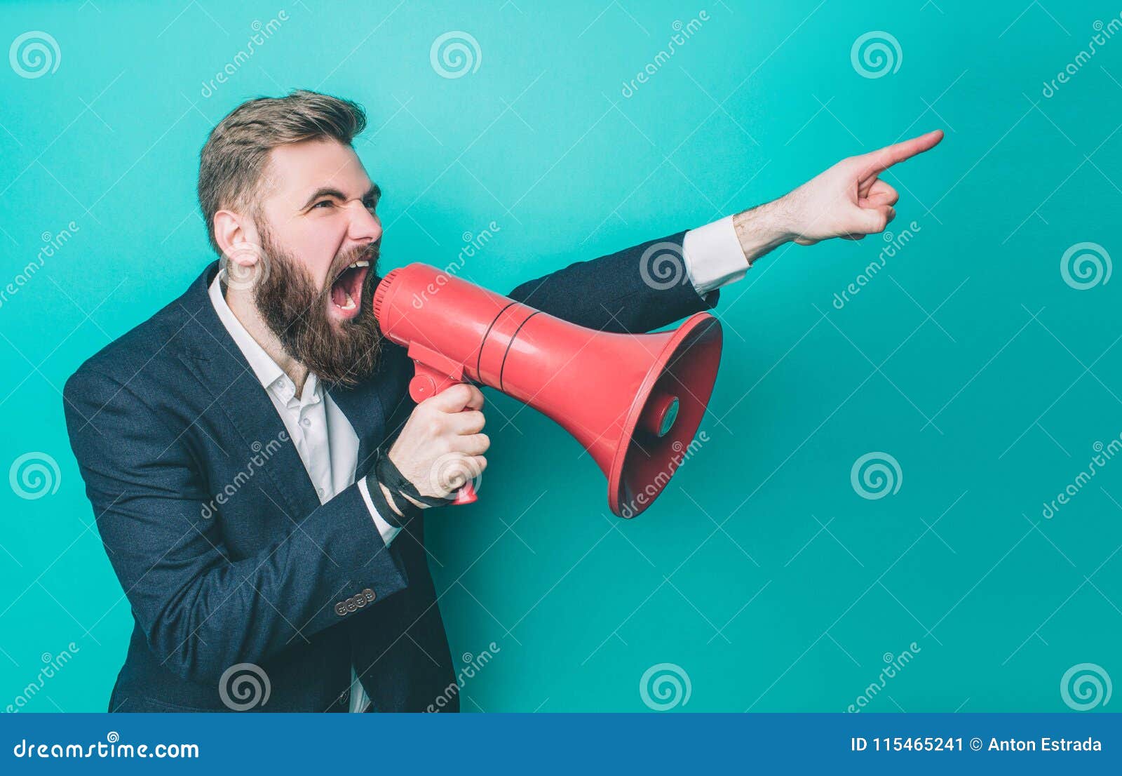 Serious Guy is Looking Straight Forward. he is Pointing and Commanding ...