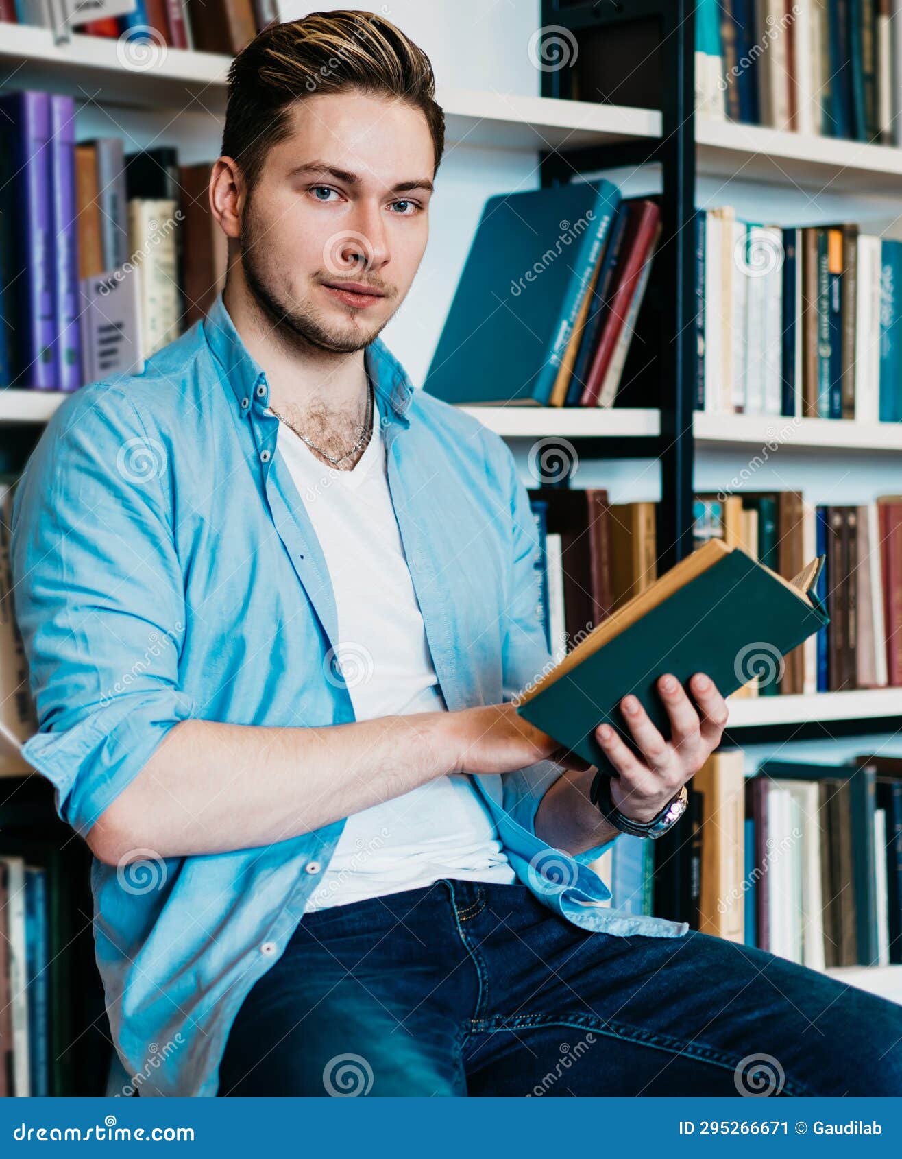 Serious Guy Reading Book in Library Stock Image - Image of creative ...
