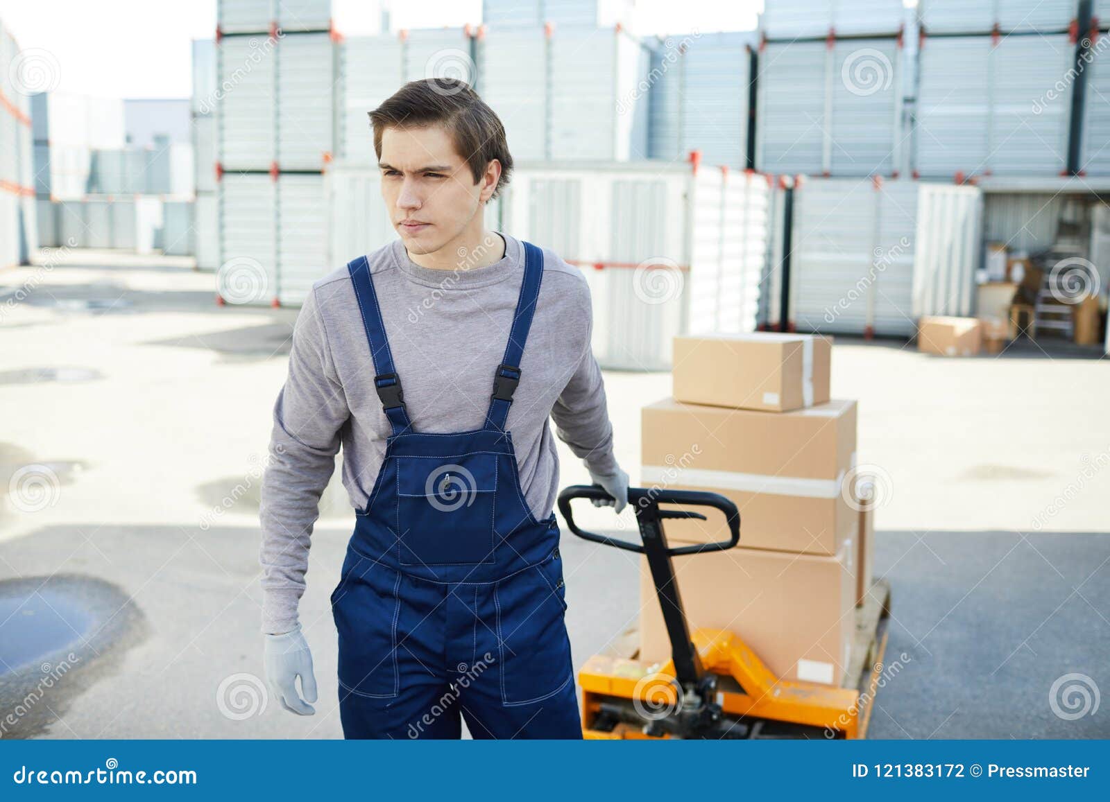 Serious Guy Working at Cargo Area Stock Photo - Image of worker, moving ...