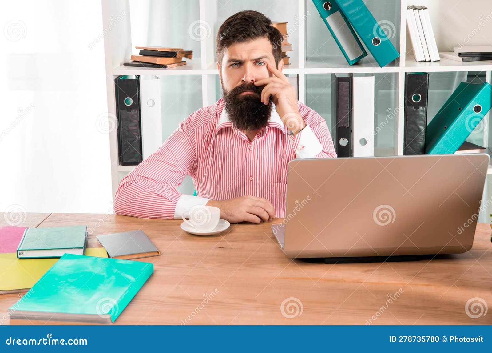 Serious Guy at Workplace. Thinking Guy Sitting at Office Desk Stock ...