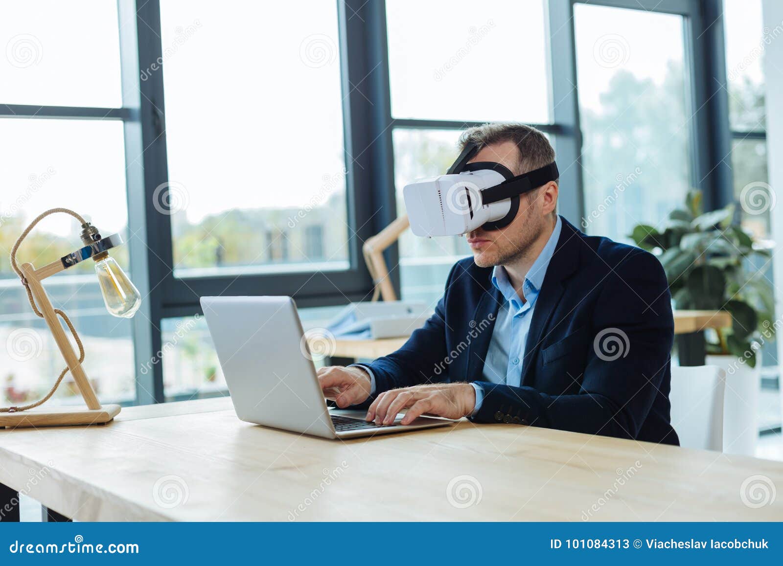 Serious Handsome Man Typing on the Laptop Stock Image - Image of male ...