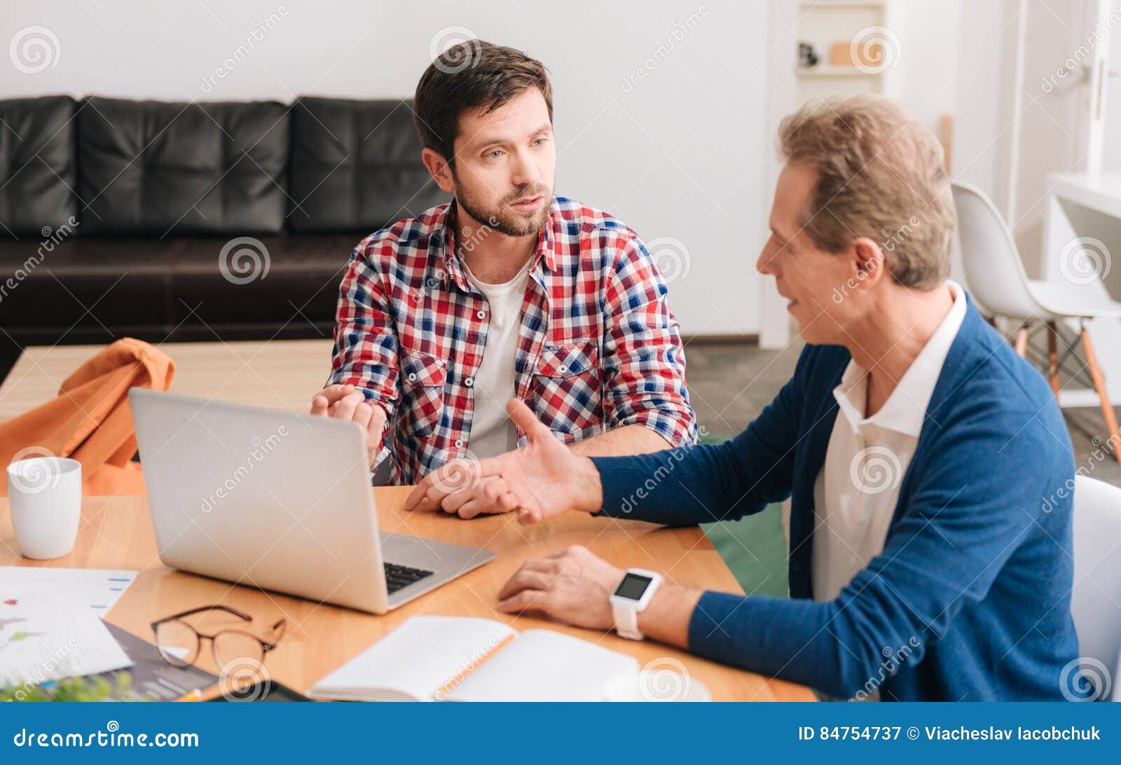Serious Hard Working Men Discussing Work Issues Stock Image - Image of ...