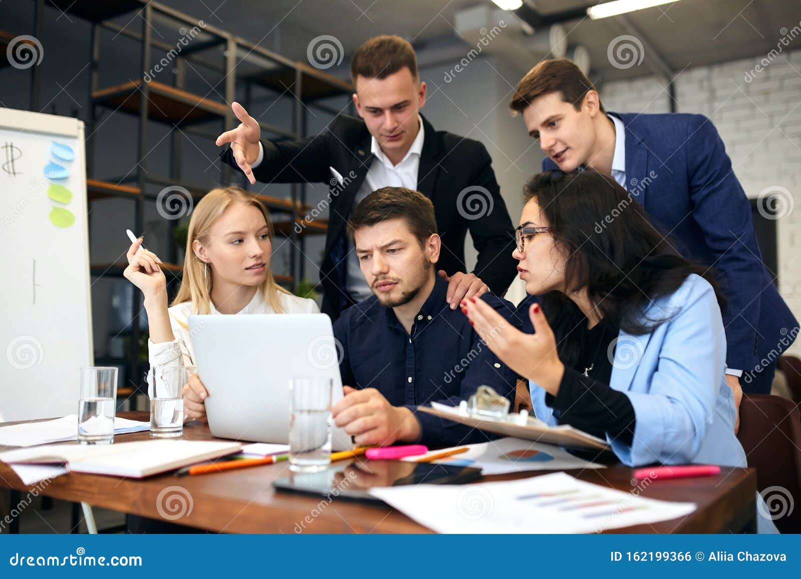 Serious Hardworking Ambitious Team Making Up a Business Plan Stock ...