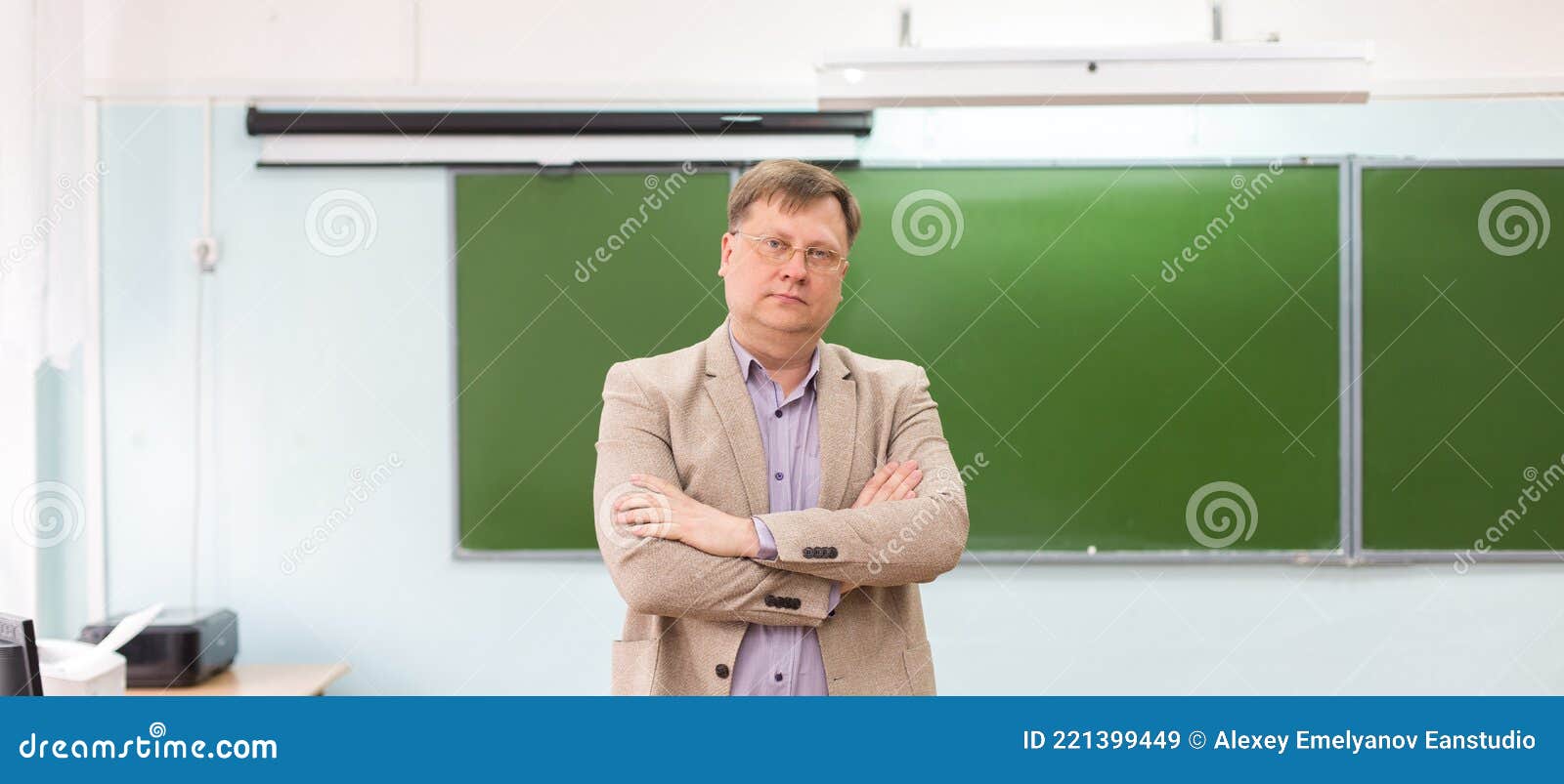 The Serious Headmaster Stands in the Classroom at the Blackboard Stock ...