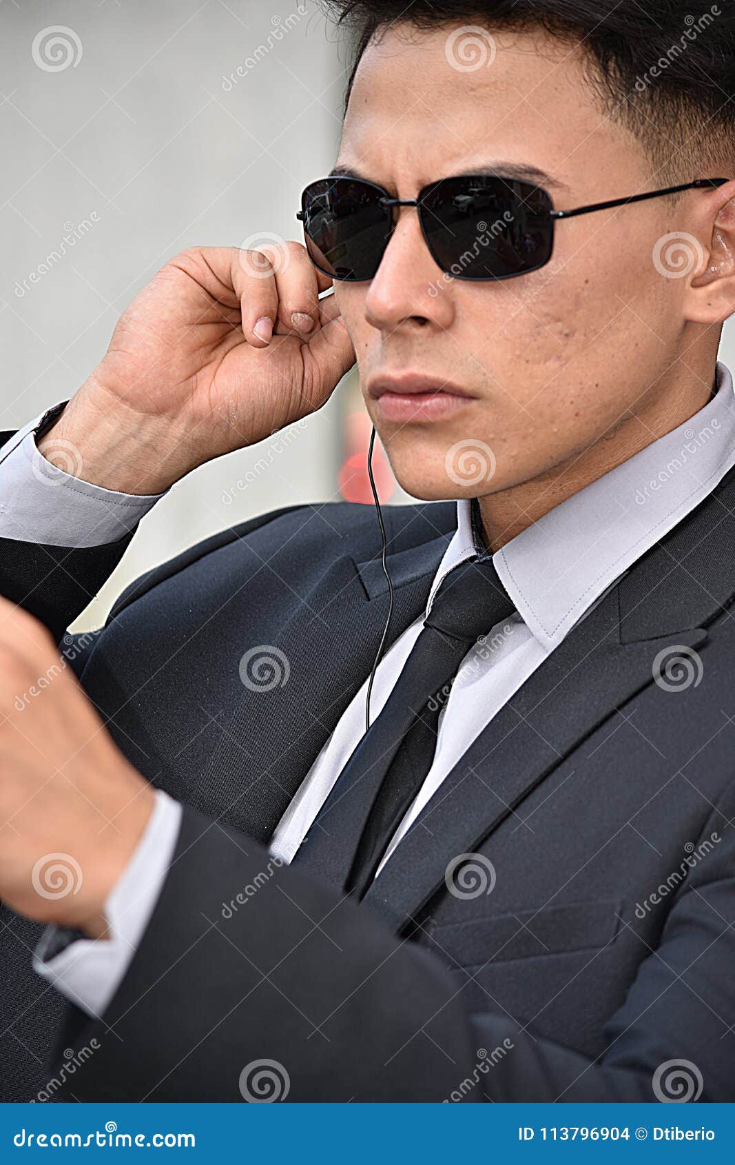 Serious Hispanic Security Guard Stock Photo - Image of apathetic ...
