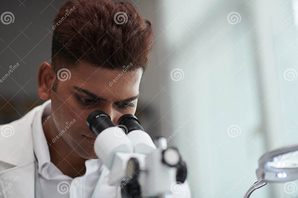 Engineer Looking into Microscope Stock Image - Image of expertise ...