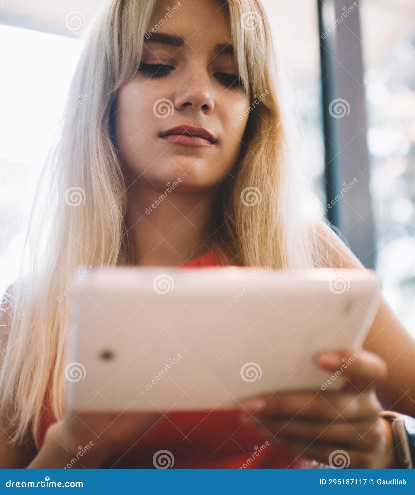 Serious Lady Browsing Tablet in Restuarant Stock Image - Image of ...