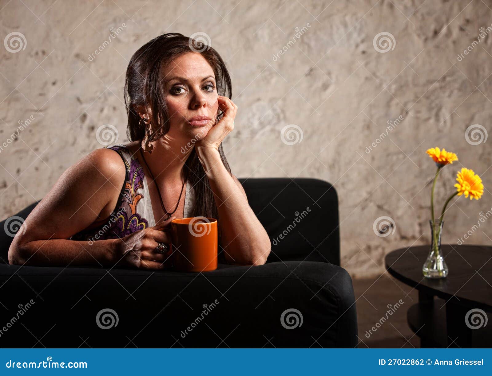 Serious Lady on Sofa stock photo. Image of depressed - 27022862