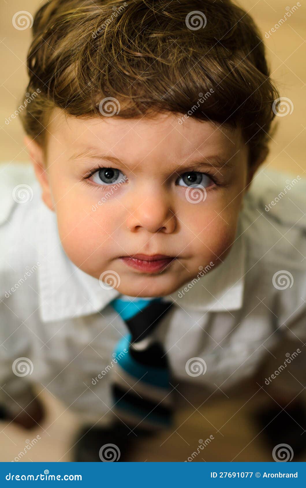 Serious little boy stock image. Image of male, smiling - 27691077