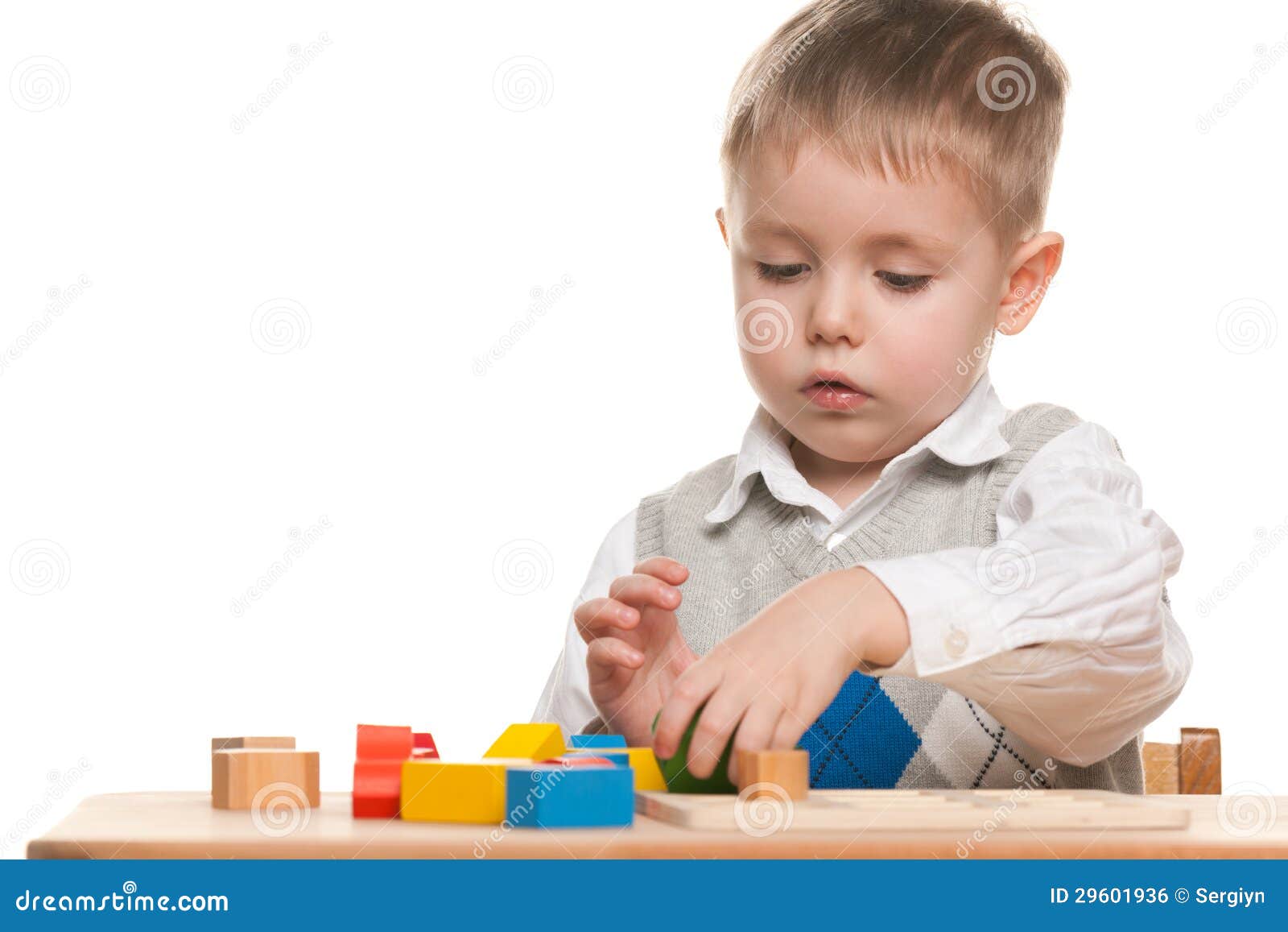 Serious Little Boy at the Desk Stock Photo - Image of enjoyment ...