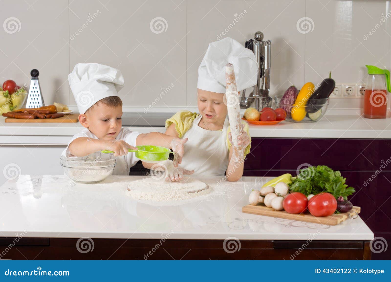 Serious Little Chefs Baking in Kitchen Stock Photo - Image of bowl ...