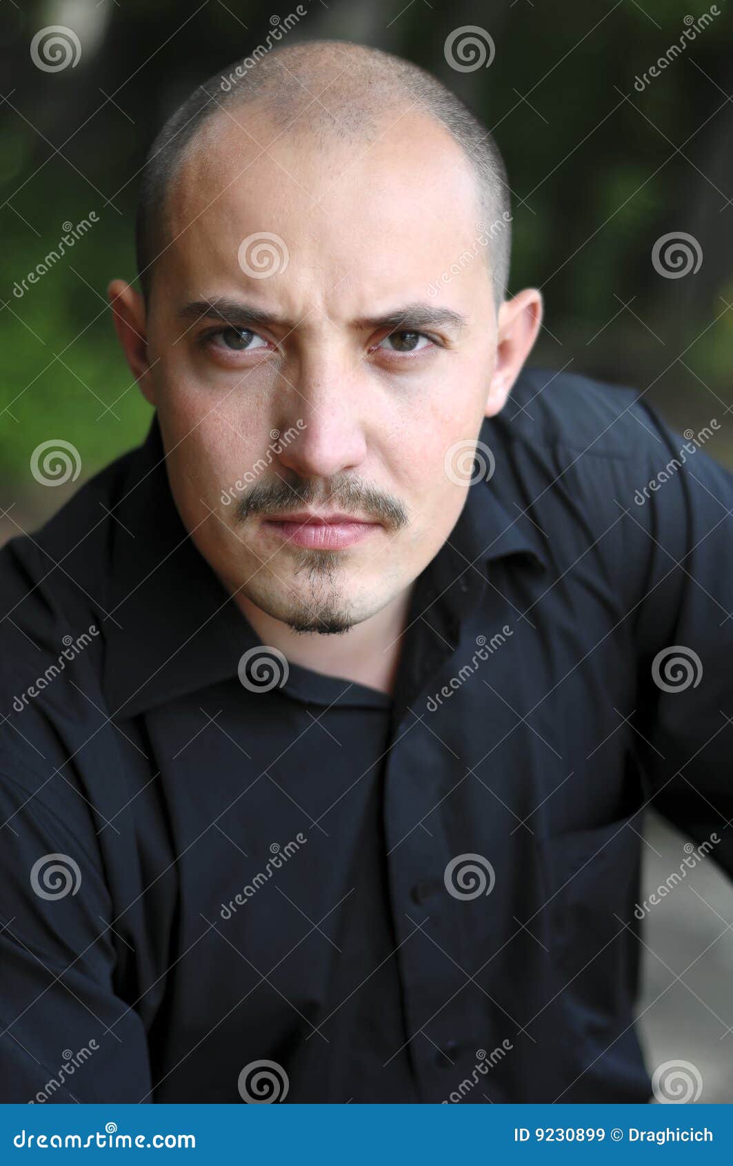 Serious-looking Handsome Blond Man Giving Hint, Pointing Fingers Down ...