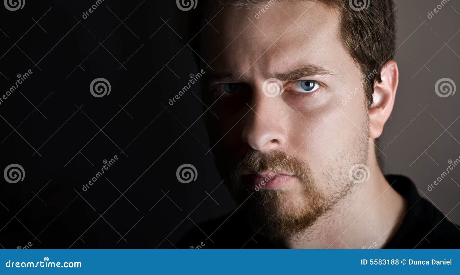 Serious Looking Man in the Shadow Stock Photo - Image of mysterious ...