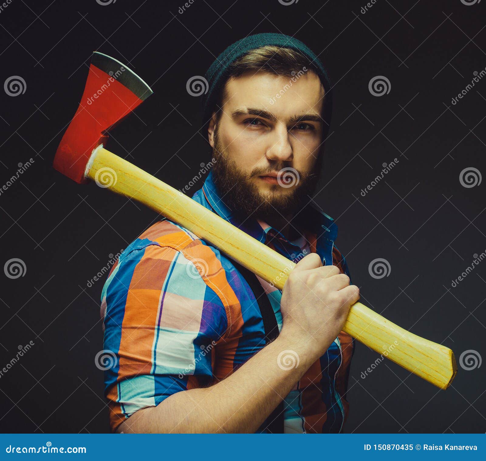 Serious Lumberjack. Confident Young Bearded Man Holding a Big Axe Stock ... Serious Lumberjack. Confident Young Bearded Man Holding a Big Axe Stock ...