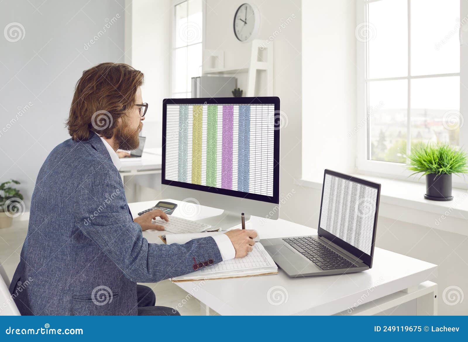 Serious Male Accountant in Office Working with Software for Electronic ...