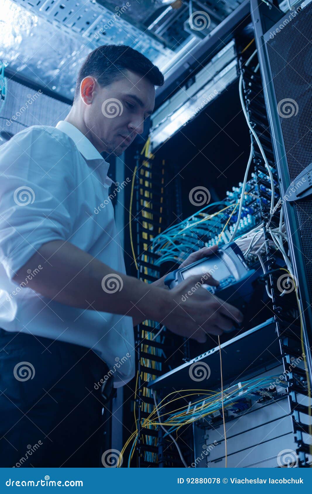 Serious Male it Administrator Working in the Data Center Stock Photo ...