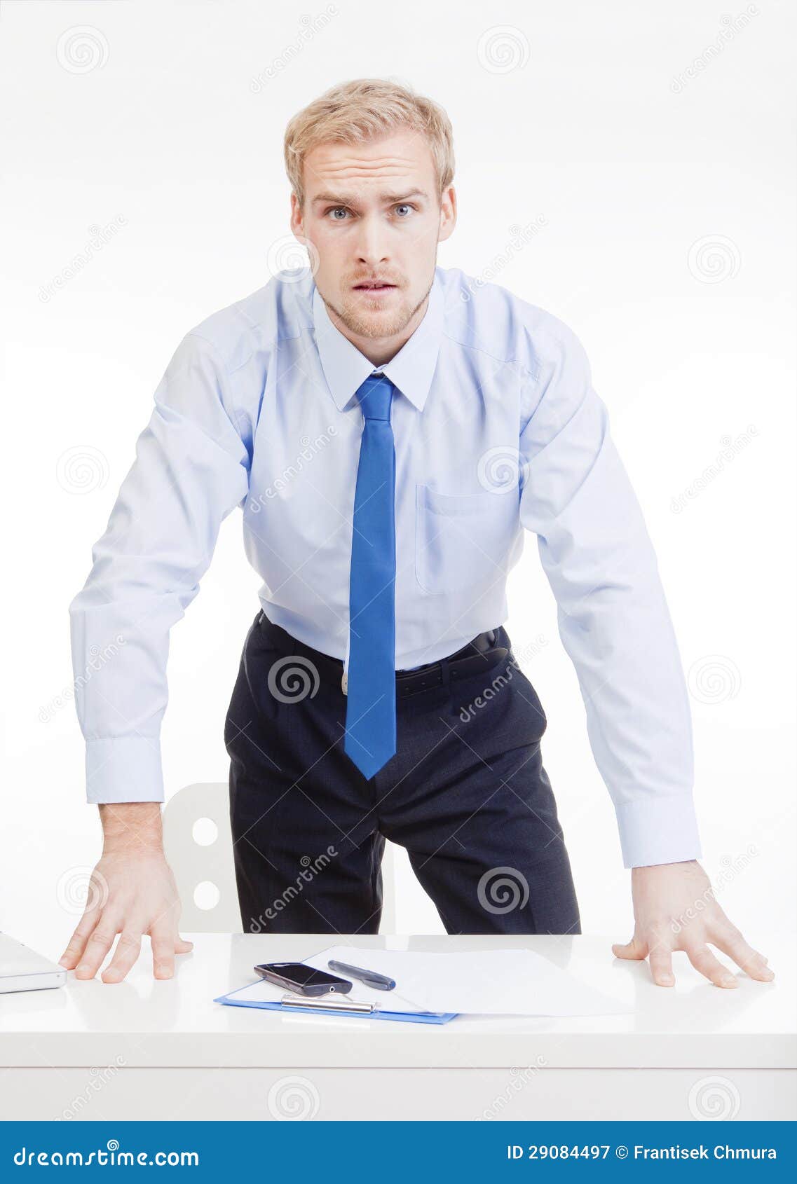 Serious man behind desk stock image. Image of caucasian - 29084497