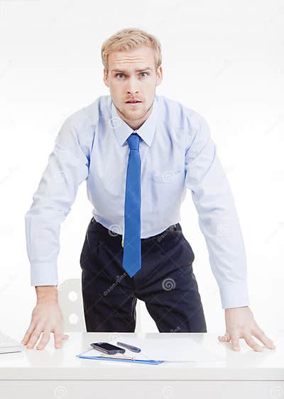 Serious man behind desk stock image. Image of caucasian - 29084497