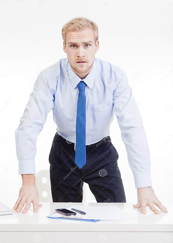 Serious man behind desk stock image. Image of caucasian - 29084497