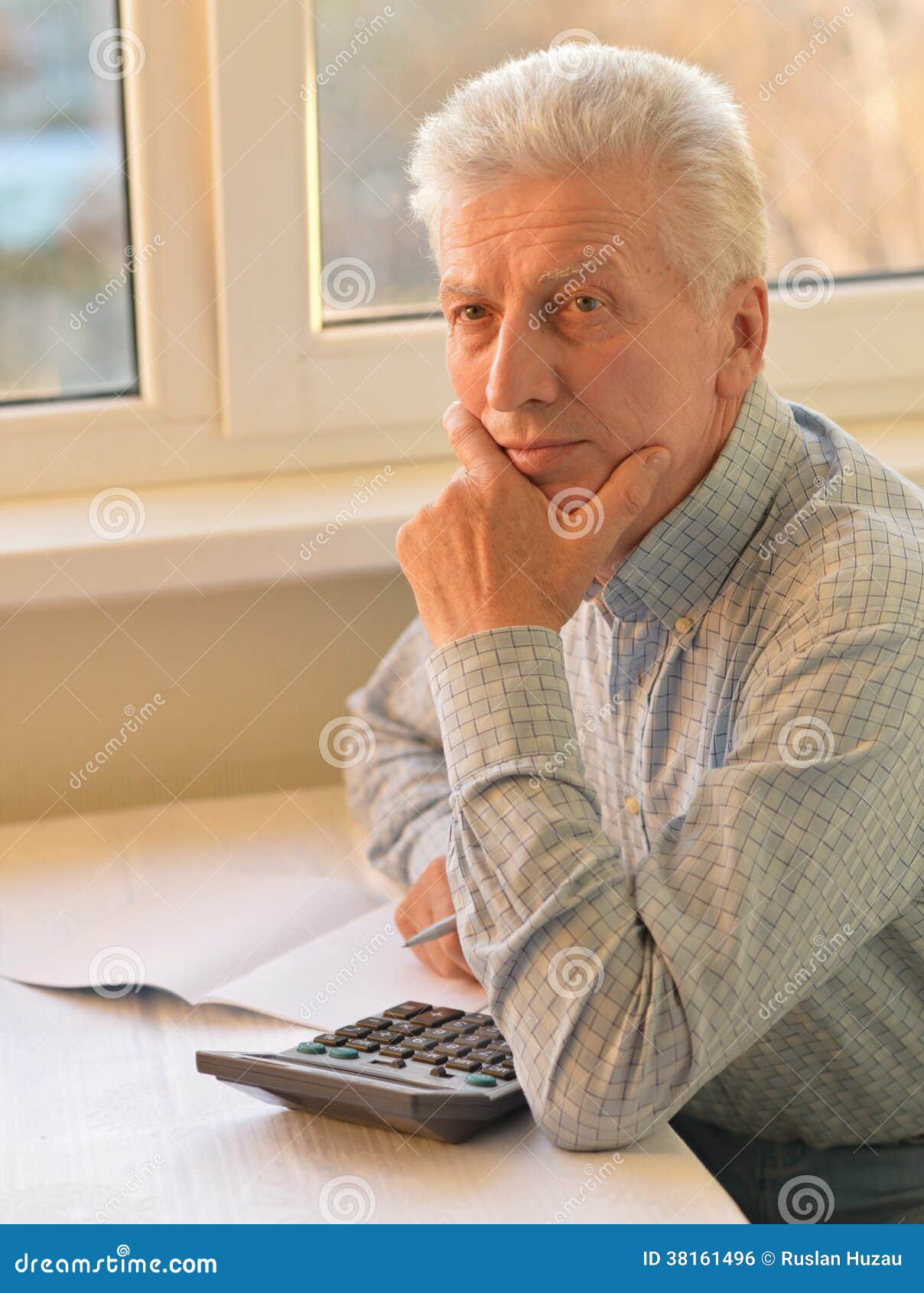Serious Man with Calculator Stock Photo - Image of aged, family: 38161496