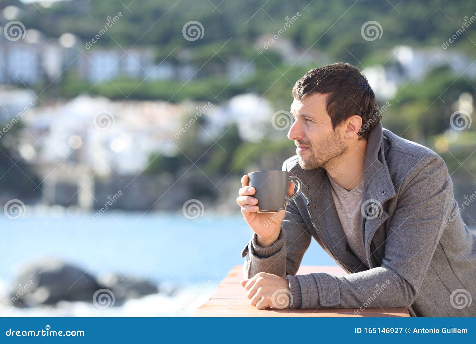 Serious Man Drinking Coffee Contemplating Views in Winter Stock Image ...