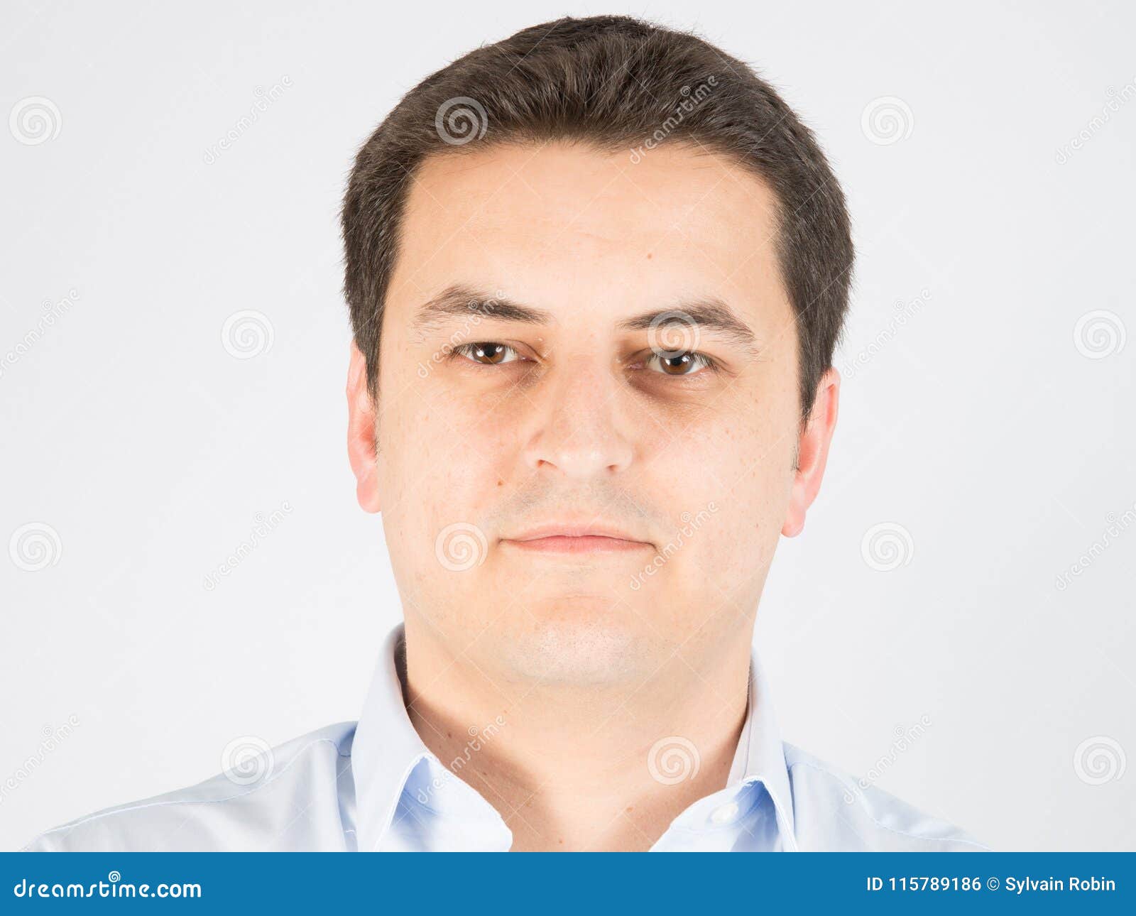 Serious Man Looking at Camera in Grey Stock Photo - Image of grey ...