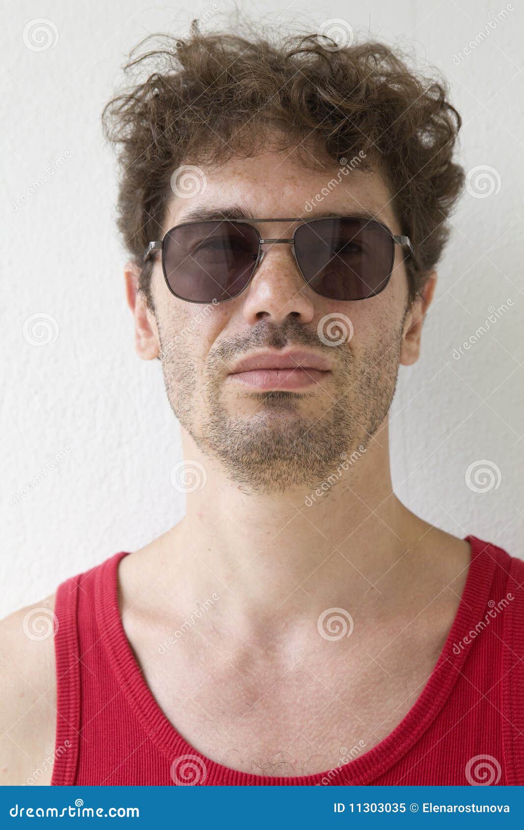 Serious man in red shirt stock image. Image of manliness - 11303035