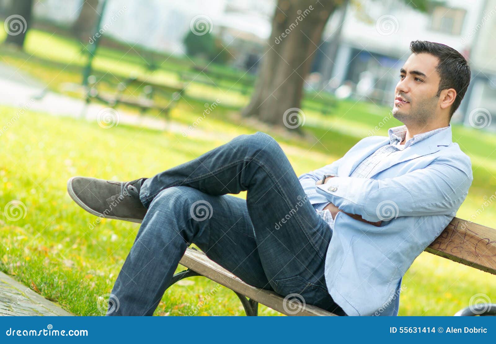 Serious Man Sitting on Bench Stock Photo - Image of person, serious ...