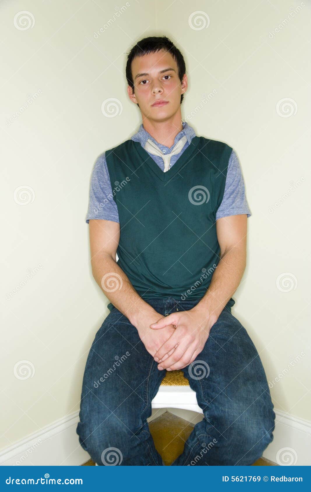 Serious Man Sitting In Corner Royalty Free Stock Images - Image: 5621769