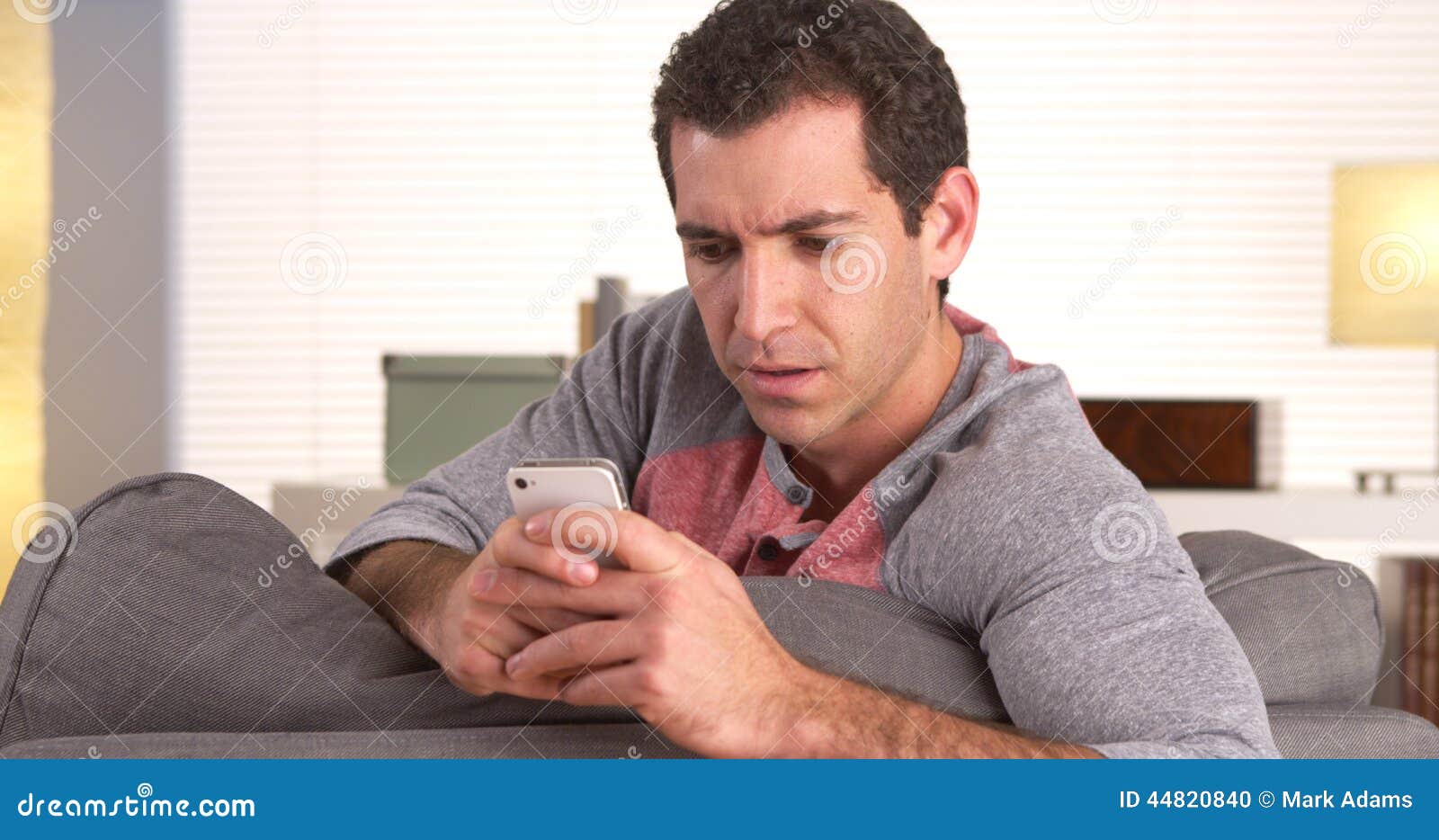 Serious Man Texting on Smartphone Stock Photo - Image of modern, home ...