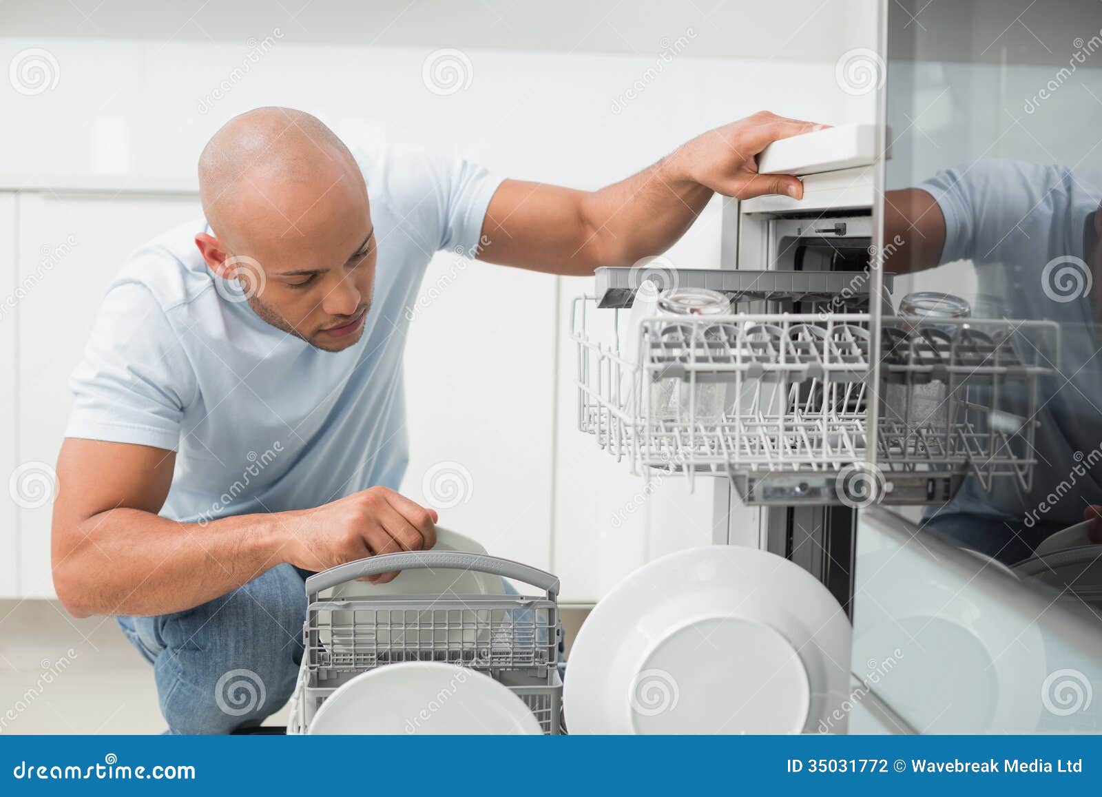 Serious Man Using Dish Washer in Kitchen Stock Photo - Image of view ...