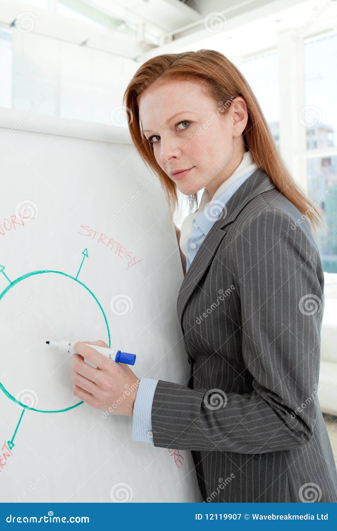 Serious Manager Giving a Presentation To Her Team Stock Image - Image ...