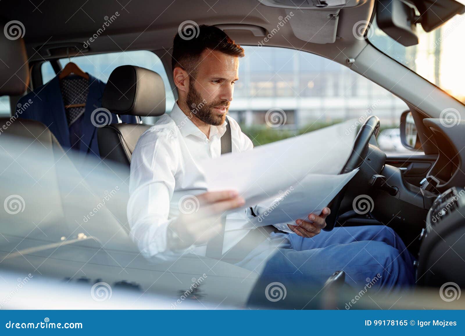 Manager Man Working on Paperwork in the Car Stock Image - Image of city ...