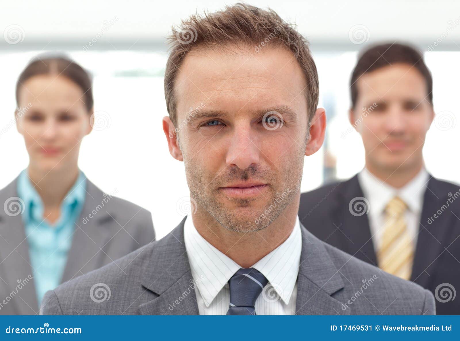 Serious Manager Posing in Front of His Colleagues Stock Image - Image ...