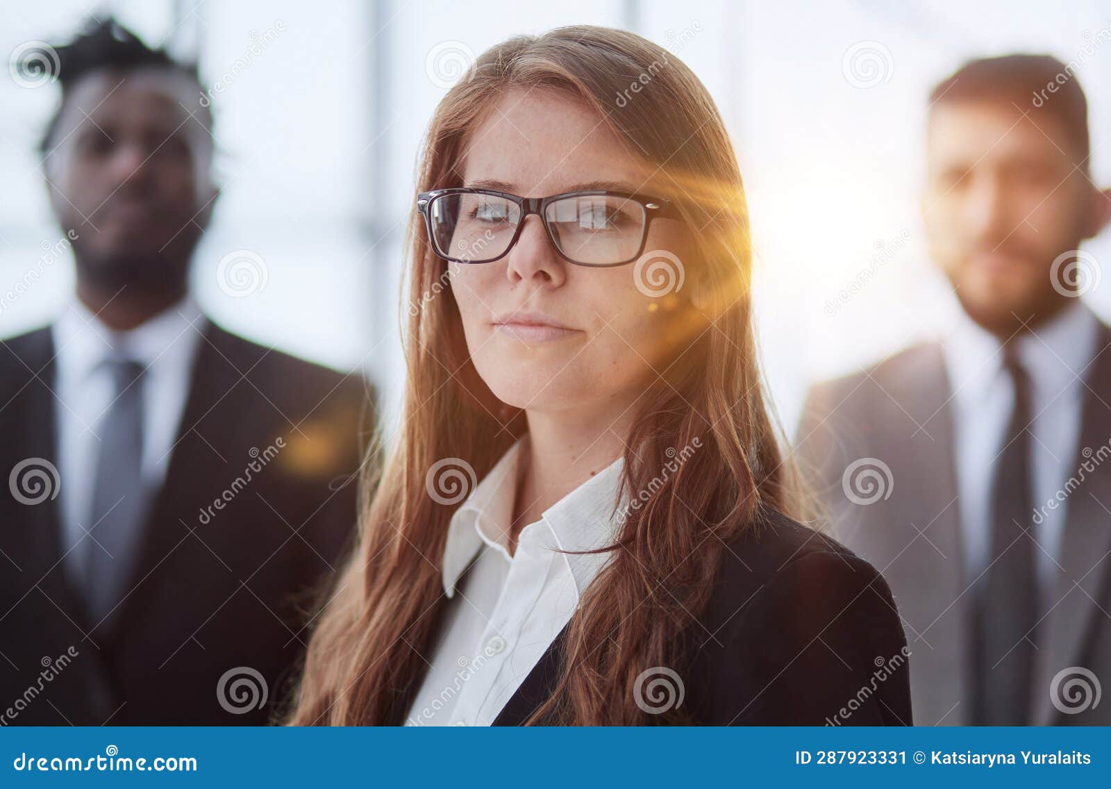 Serious Manager Posing in Front of His Two Employees Stock Image ...