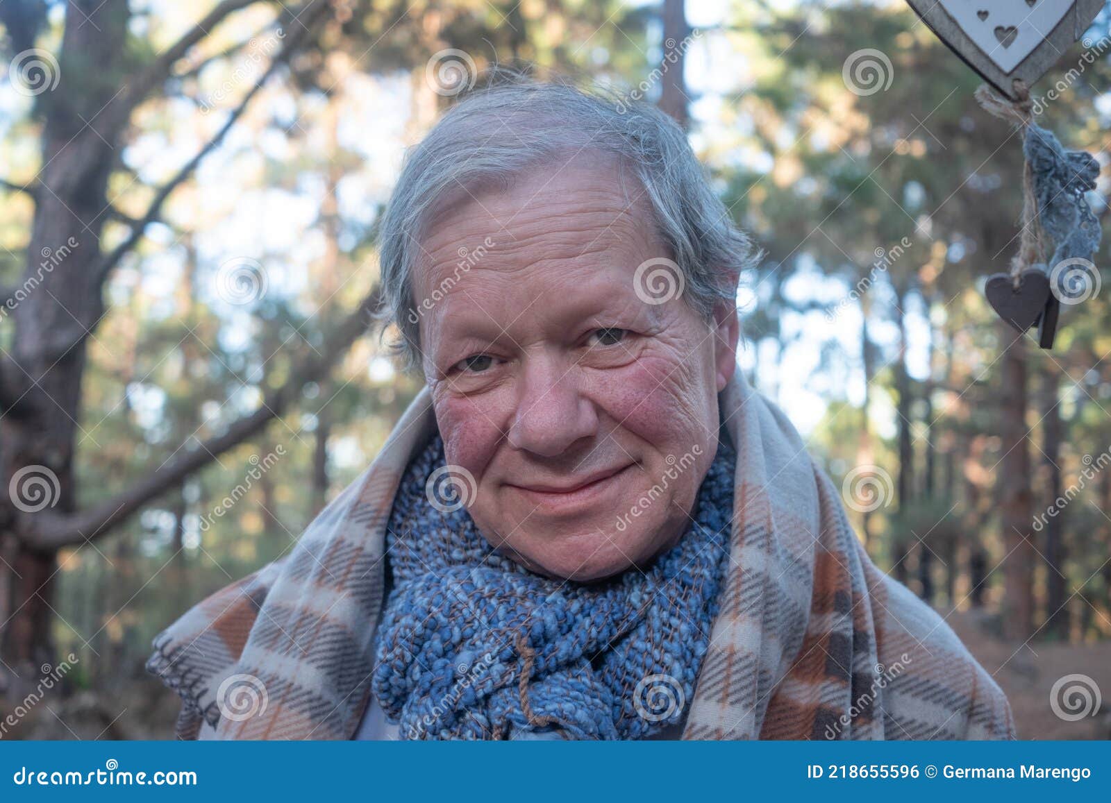 Serious and Melancholy Old Man Outdoors in the Woods Looking at Camera ...