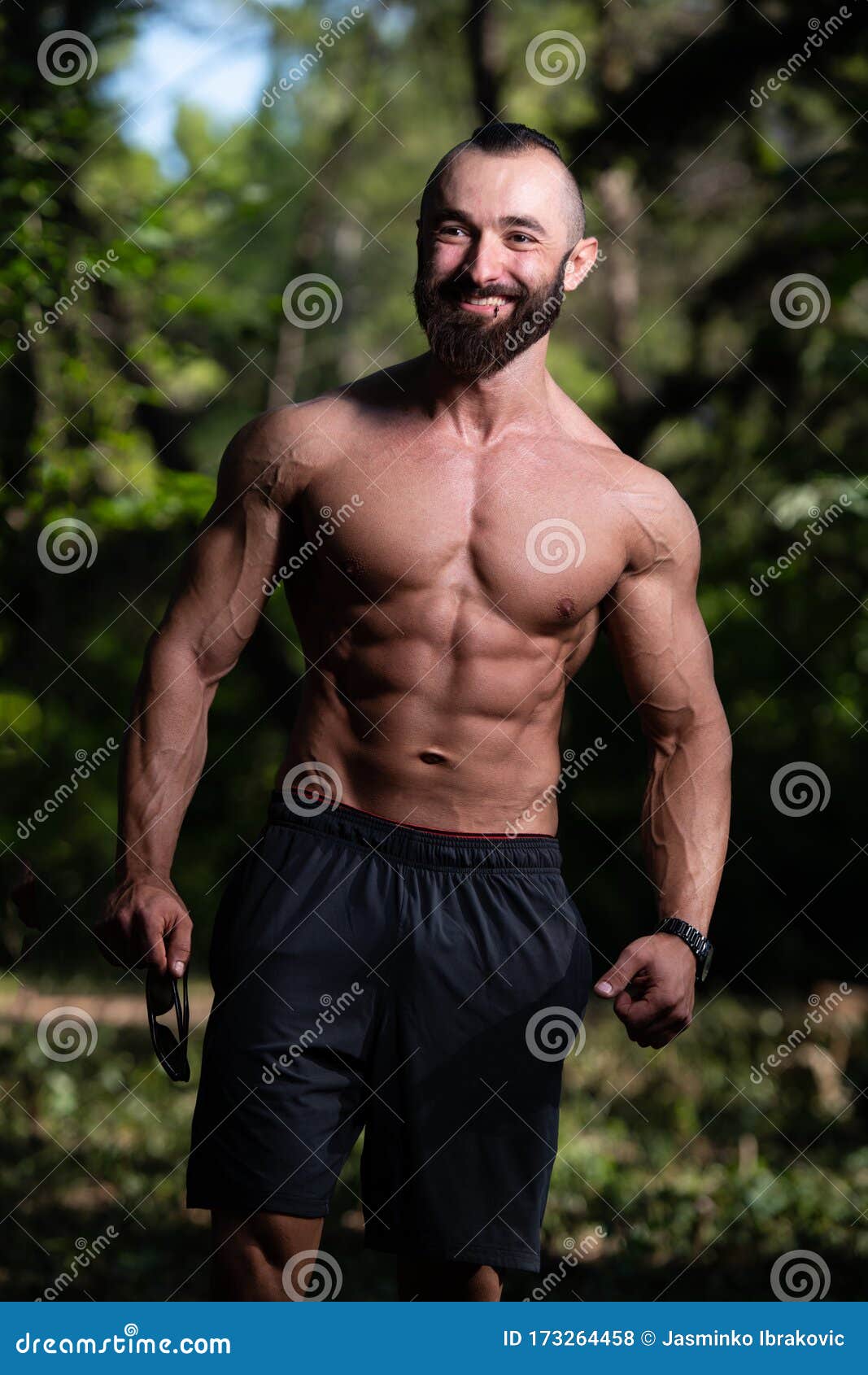 Serious Model Standing Outdoors Stock Photo - Image of flexing, healthy ...